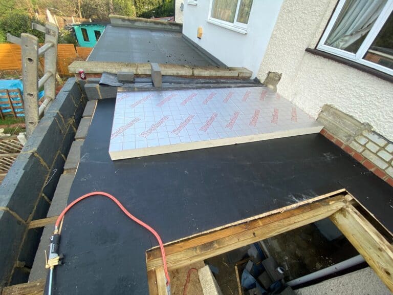 How to Insulate a Flat Roof Efficiently and Effectively - Asgard Roofing