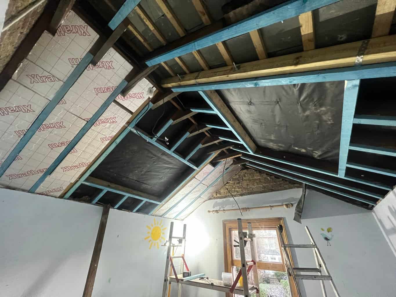 How to Insulate a Flat Roof Efficiently and Effectively - Asgard Roofing