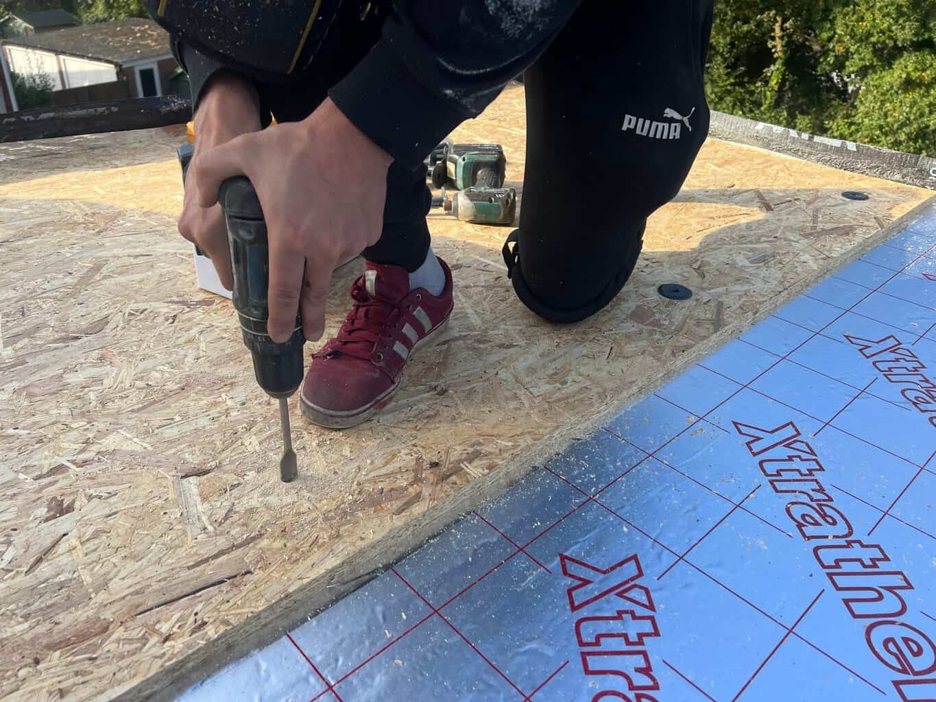 How to Insulate a Flat Roof Efficiently and Effectively - Asgard Roofing
